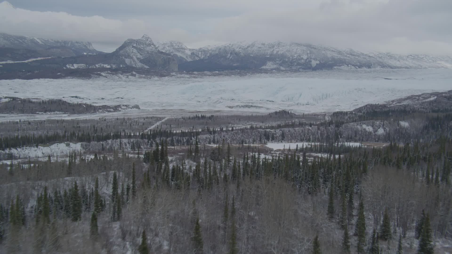 4K stock footage aerial video approaching Matanuska Glacier near snow ...