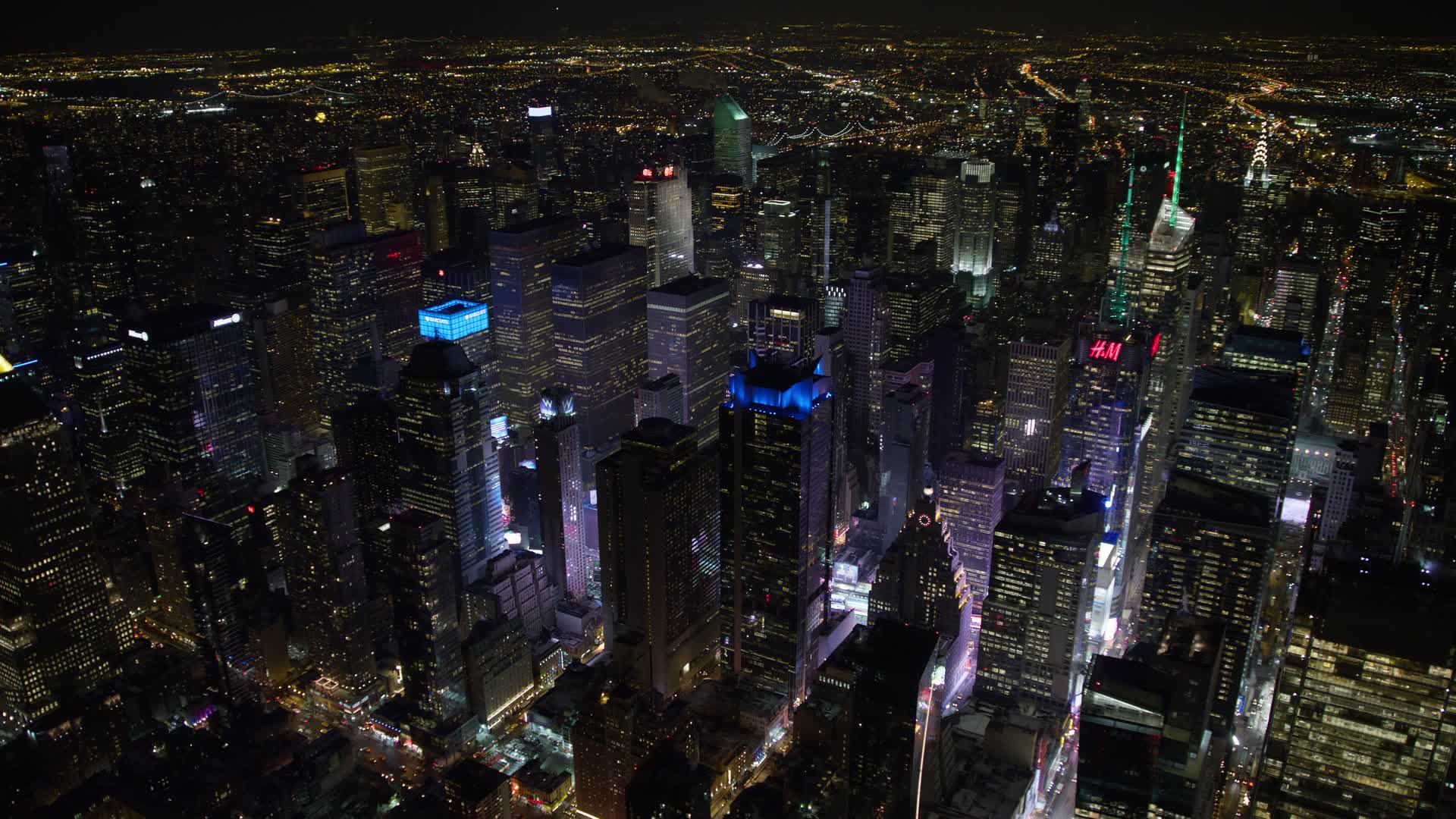 4.8K aerial video view circling the bright lights of Times Square at ...