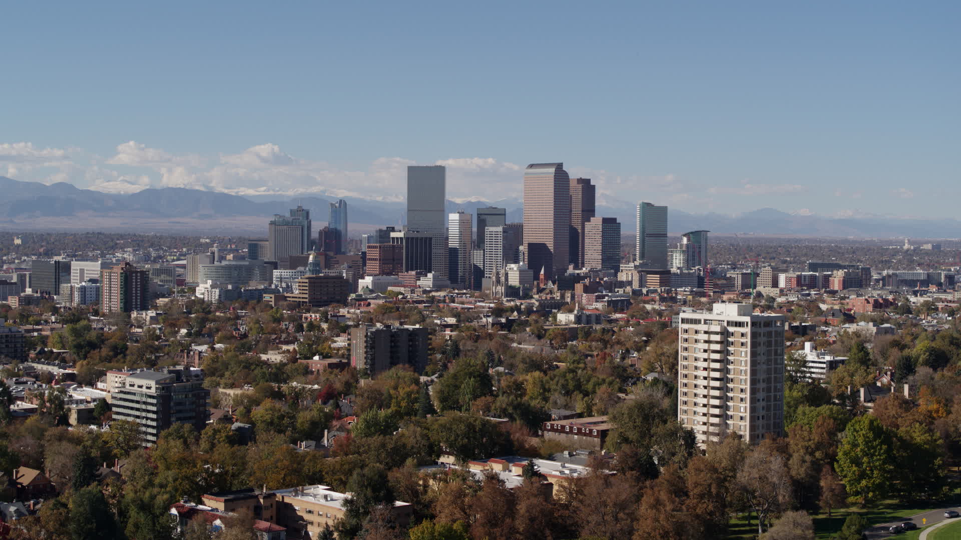 5.7K stock footage aerial video of the city's skyline with mountains in ...