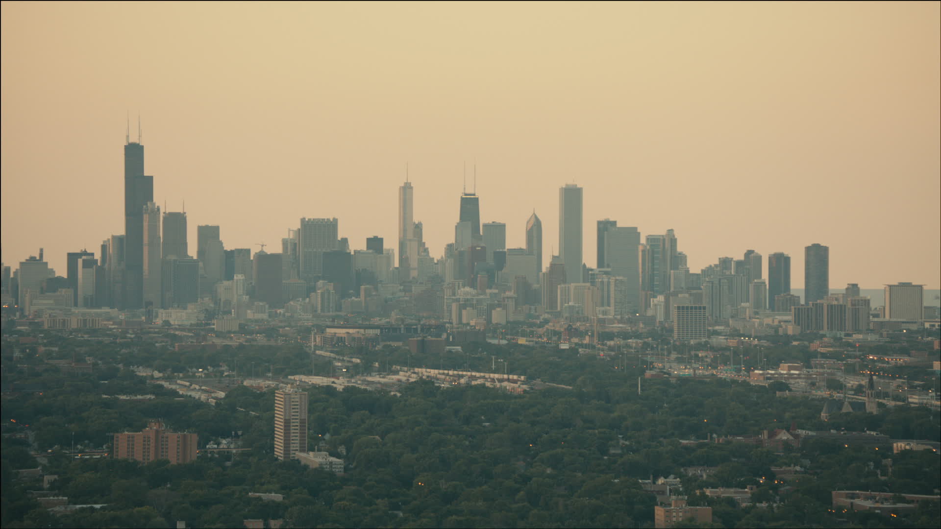 HD stock footage aerial video of the hazy skyline at sunset in Downtown ...